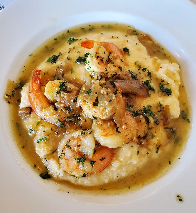 Shrimp and grits so good they'll make you want to hug the chef. Plump Gulf shrimp nestled on creamy stone-ground grits&mdash;comfort food elevated to an art form.