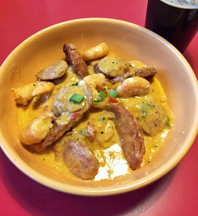 Shrimp and grits that would make a Charleston chef weep with joy &ndash; plump shrimp, smoky bacon, and creamy grits creating a holy trinity of Southern flavor.