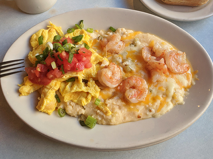 The holy grail of Southern comfort: Elmo's shrimp and grits pairs plump, perfectly cooked seafood with creamy grits that would make your grandmother weep with joy.
