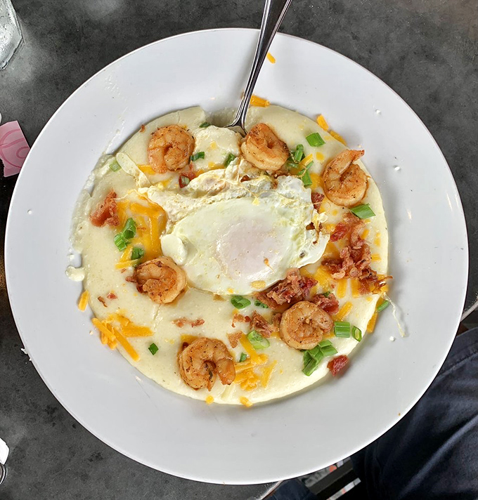 Behold the legendary Red's Shrimp & Grits&mdash;where plump shrimp and creamy grits unite in a marriage so perfect it should have its own reality show.
