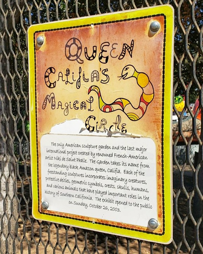 The official introduction to wonderland. This unassuming sign hardly prepares you for the explosion of creativity waiting just beyond the gate.