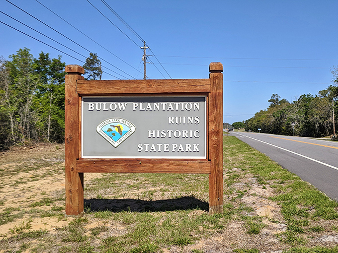 Your first clue to hidden treasure. This unassuming sign marks the entrance to one of Florida's most historically significant yet overlooked state parks.