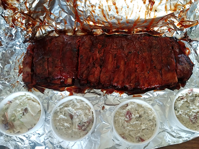Behold the holy grail of smoked meat &ndash; a full slab of ribs with perfect bark, accompanied by potato salad that your grandmother would approve of.