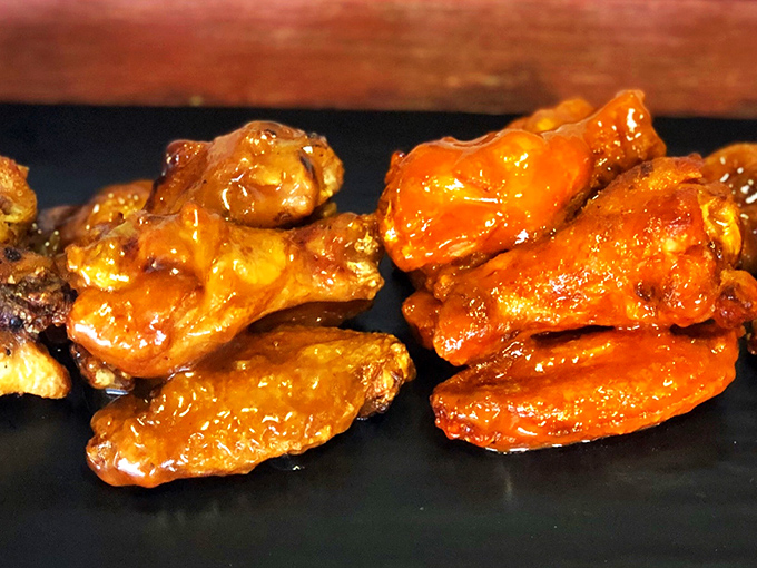 These wings aren't just sauced &ndash; they're transformed. Two different flavor journeys waiting to happen, glistening with promise and worthy of your undivided attention.