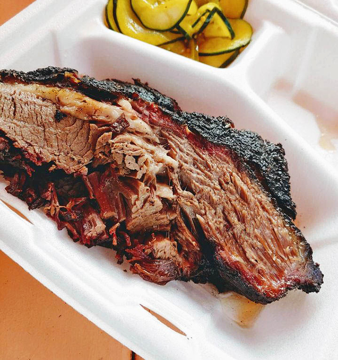 Behold the holy grail of barbecue&mdash;brisket with that perfect pink smoke ring and bark so beautiful it belongs in a museum of meat masterpieces.
