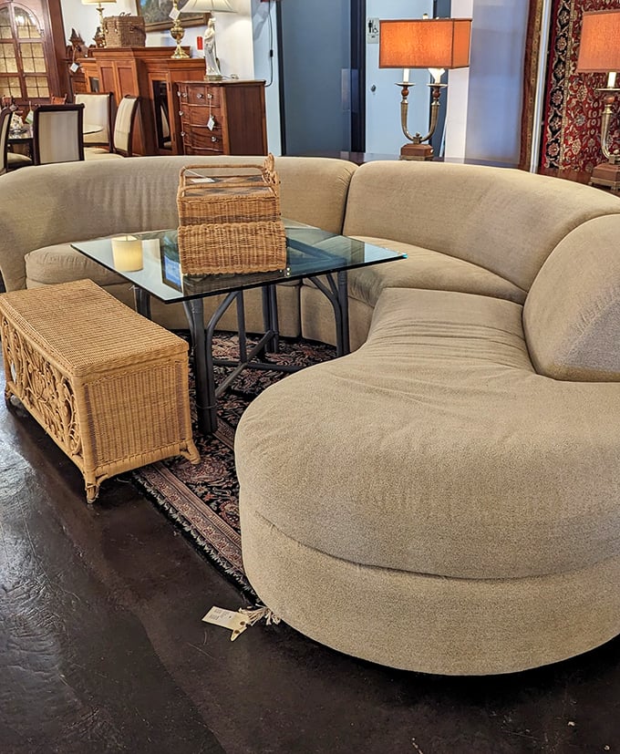 This curved sofa isn't just seating&mdash;it's a statement that says, "Yes, I have both style and enough space for furniture that doesn't fit against walls."
