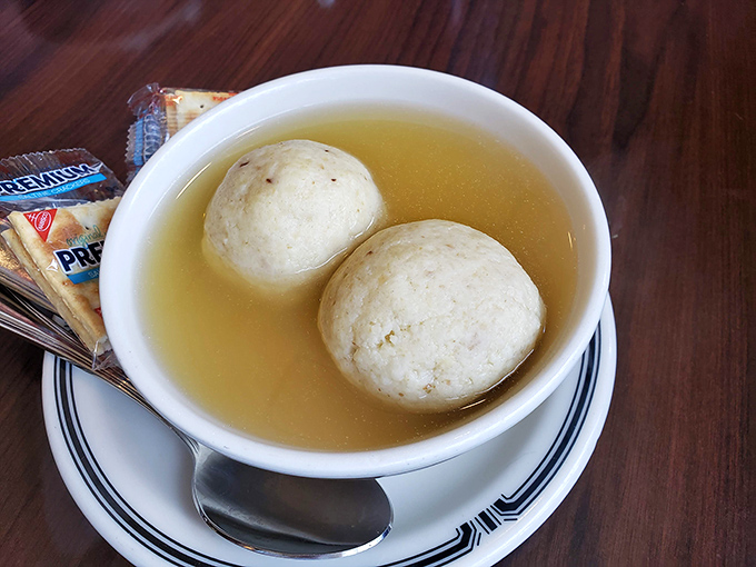 Not one but TWO matzo balls floating like perfect dumplings in golden broth. This isn't soup&mdash;it's Jewish penicillin in its purest form.