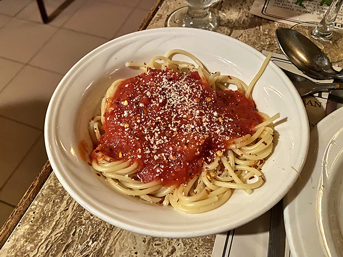 Simplicity perfected: spaghetti with red sauce and a snowfall of cheese. Sometimes the classics become classics because they're simply unbeatable.