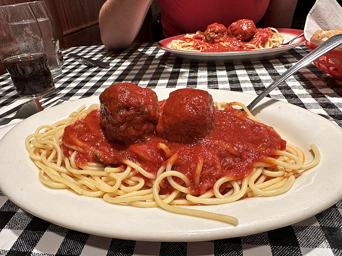 This isn't just spaghetti - it's the kind of pasta that makes grown adults weep tears of joy.