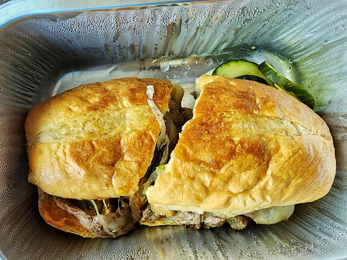 Meet the legendary Spicy Steak Sandwich in all its glory. That golden bun barely containing its treasures is the edible equivalent of a warm hug.