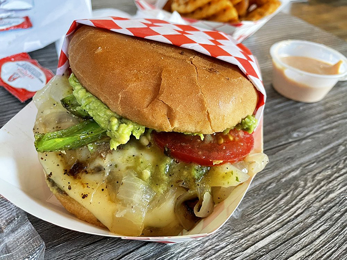 That spicy burger arrives dressed to thrill, with melted cheese cascading like a delicious lava flow.