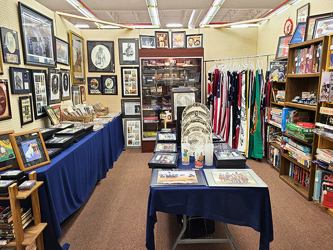 Sports memorabilia mingles with vintage collectibles in this carefully curated booth. From framed photos to pennants, nostalgia flows through every item.