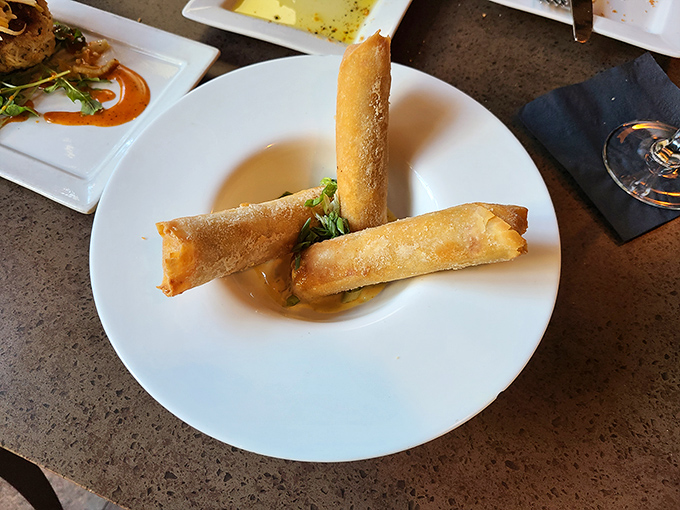 These golden cylinders of joy stand at attention, ready to conquer your appetite with crispy perfection.