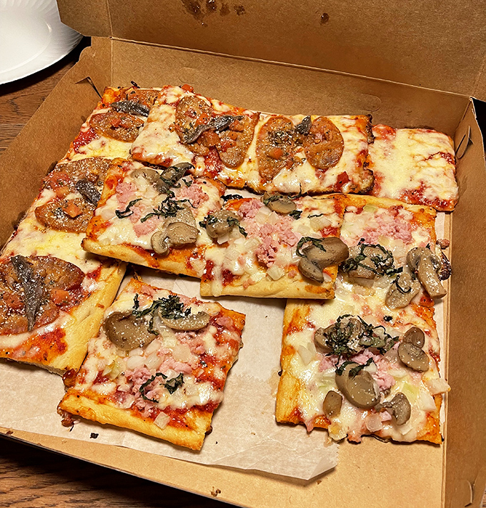 Square pizza perfection in its natural habitat &ndash; the distinctive shape means more crispy edges and perfect cheese-to-sauce ratio in every magnificent bite.