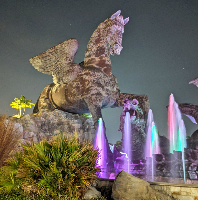 Night transforms this epic sculpture into something even more magical with dramatic lighting effects.