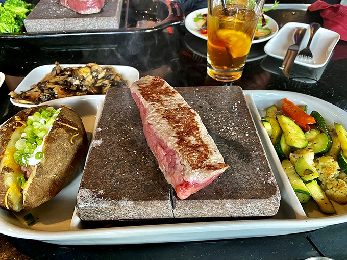 Not just a steak, but a performance piece &ndash; sizzling on volcanic stone that transforms dinner into dinner theater.