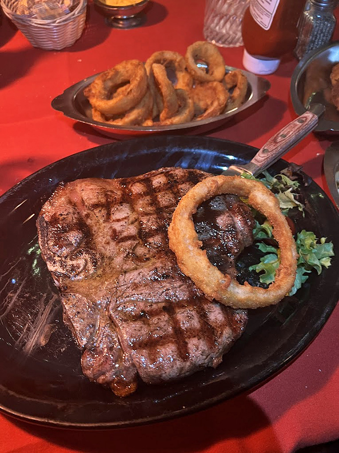 This isn't just a steak; it's a masterclass in the art of beef. That perfect char, that onion ring crown&mdash;this plate has more star power than most Hollywood blockbusters.