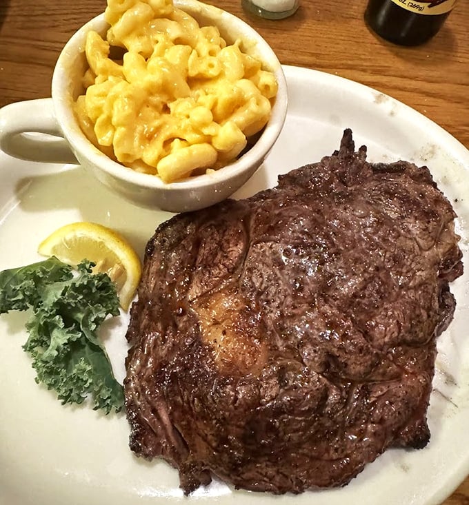 This isn't just a steak; it's a masterpiece of marbling and char, paired with creamy mac and cheese that would make your grandmother jealous.