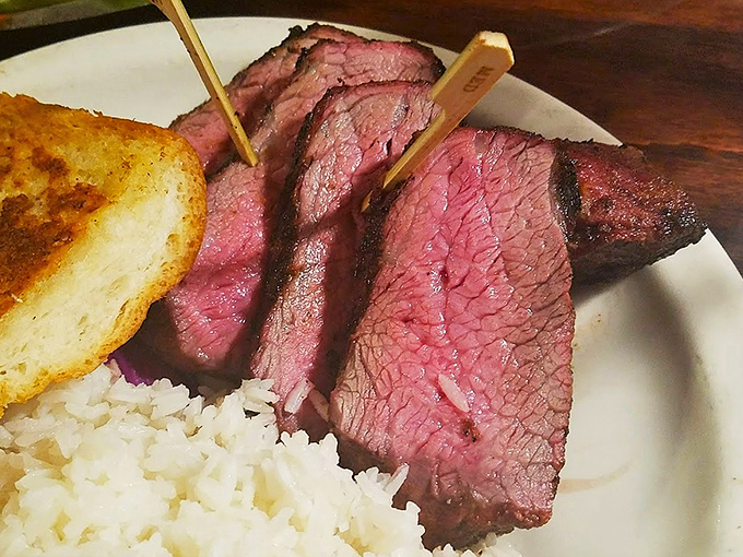 Perfectly pink slices of beef that make vegetarians question their life choices. That char on the outside is what happens when fire and meat achieve perfect harmony.