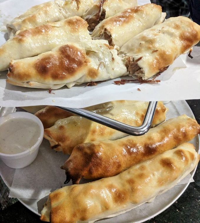 Behold the breadstick in its natural glory! Golden-brown on the outside, molten cheese paradise on the inside. This isn't food&mdash;it's an experience wrapped in dough.