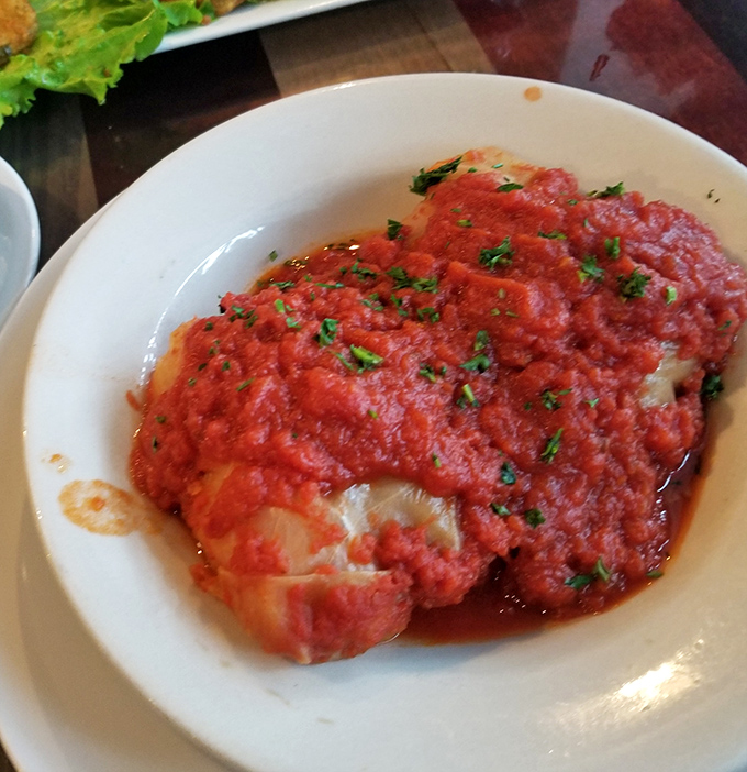 The stuffed cabbage that launched a thousand road trips. That vibrant tomato sauce isn't just photogenic—it's the kind of comfort that makes you call your mother with gratitude.