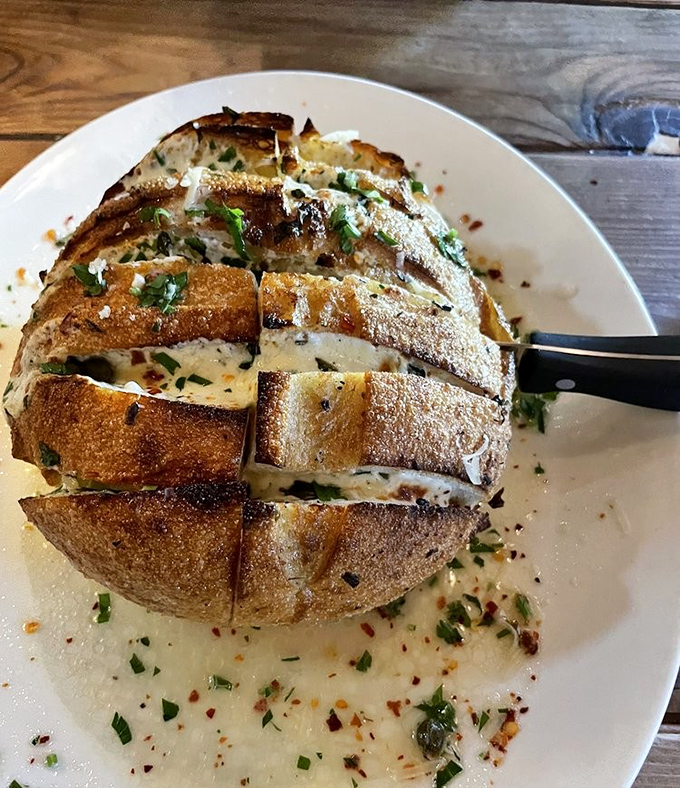 This isn't just bread&mdash;it's a sourdough treasure chest filled with melted goodness that makes you want to cancel your next three appointments.