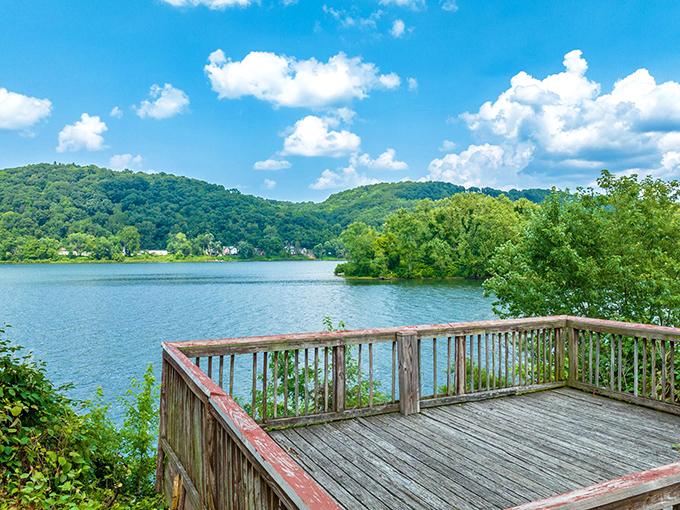This riverside deck offers front-row seats to nature's daily performance—where the only admission price is the time you're willing to spend.