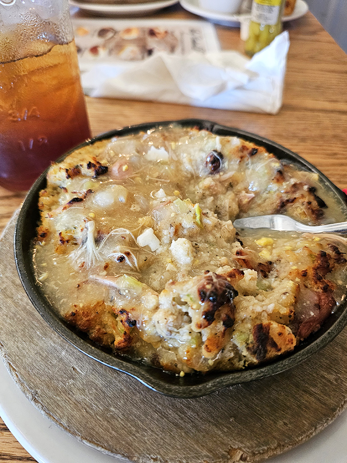 The legendary sweet potato casserole that launched a thousand road trips, bubbling with buttery, caramelized perfection.