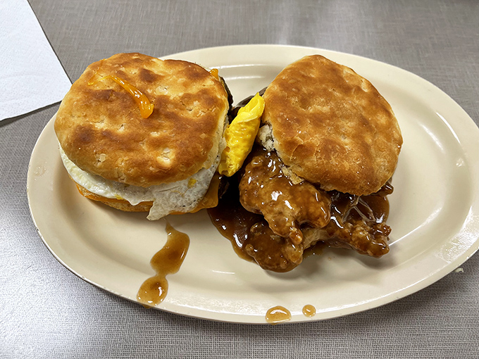 Behold the breakfast of champions: a tenderloin biscuit sandwich with gravy that could make even the most dedicated dieter temporarily abandon their principles.