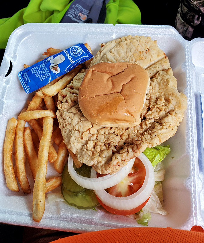 Behold the legendary tenderloin &ndash; a golden-fried masterpiece that laughs at the concept of bun-to-meat ratio.