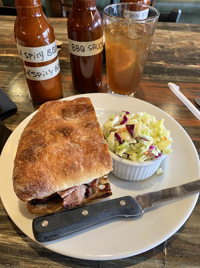 This tri-tip sandwich isn't just lunch—it's a commitment to excellence. The bread's perfect crunch gives way to meat so tender it practically surrenders.