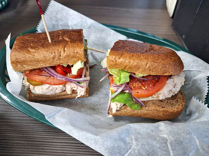 Fresh tuna salad meets crispy perfection in this pressed masterpiece that redefines comfort food standards completely.