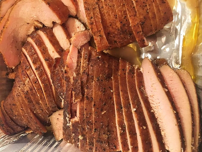Smoked turkey that defies physics &ndash; somehow remaining impossibly moist. Each slice carries the perfect balance of smoke and spice, a poultry masterpiece.