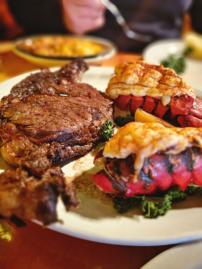 A steak and twin lobster tails that would make Neptune and a cattle rancher equally proud. Surf and turf perfection on a plate.
