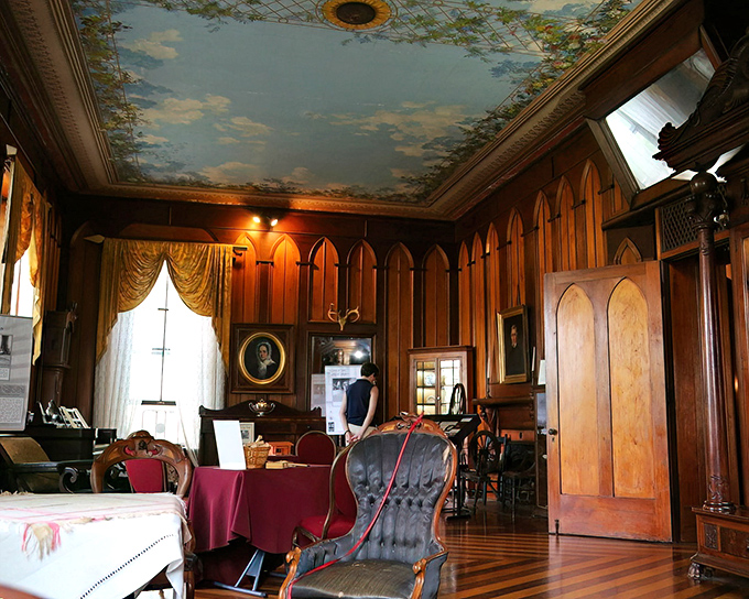 Step into this wood-paneled parlor with its painted ceiling and feel like you've crashed a 19th-century gathering where important decisions were made over brandy.
