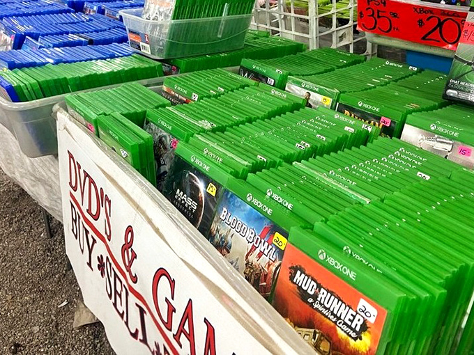 Video game heaven for budget-conscious gamers. Each green case holds digital adventures waiting to be rediscovered like old friends.