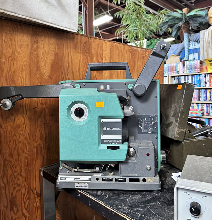 This vintage Bell & Howell projector isn't just retro tech&mdash;it's waiting to show someone's forgotten vacation slides from 1962.