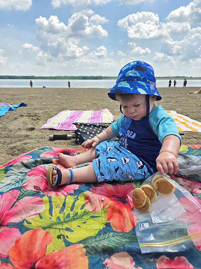 Beach day democracy in action: everyone's equally terrible at applying sunscreen to their own back.