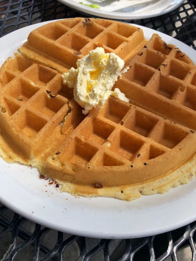 Behold the star attraction &ndash; a golden waffle with deep pockets perfectly designed for capturing rivers of melting butter and maple syrup.