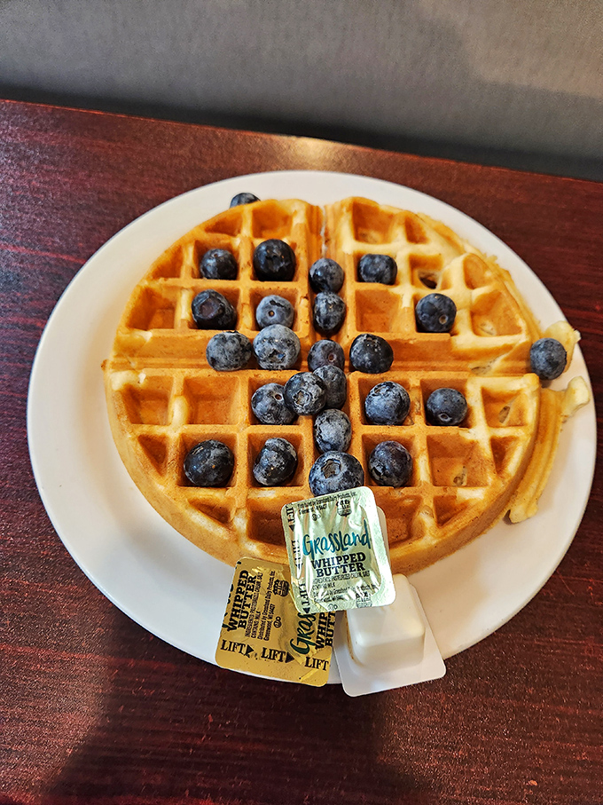 Golden perfection meets blueberry bliss. Those perfect grid indentations aren't just for show &ndash; they're nature's syrup reservoirs.