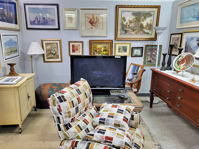 Gallery wall goals achieved without the gallery prices. This cozy living room setup proves secondhand doesn't mean second-rate in the style department.