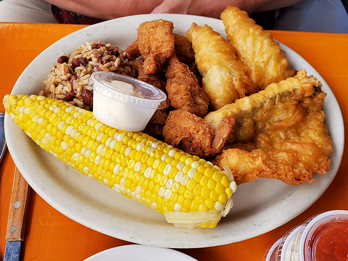 A plate that answers the eternal question: "Why choose one when you can have it all?" The corn and rice provide moral support for the star performers.