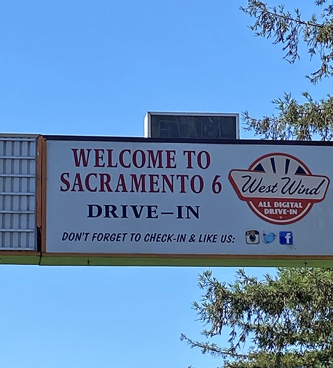 The welcome sign stands as a portal to simpler times. "All Digital Drive-In" proves even nostalgia gets occasional upgrades.