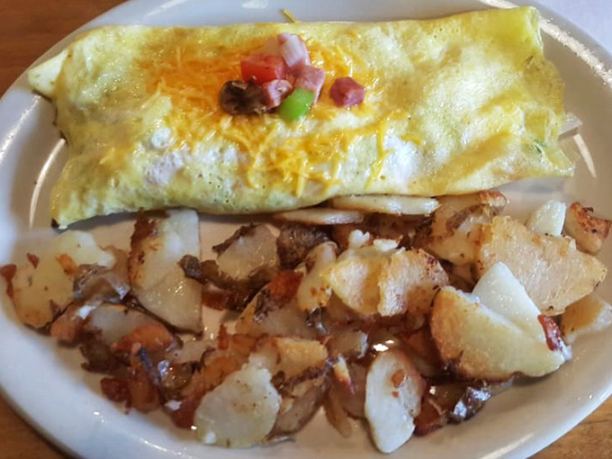 The Western omelet that launched a thousand road trips. Perfectly folded eggs with just the right ham-to-pepper ratio and those home fries!