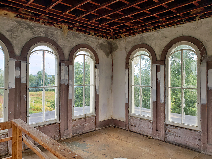 These arched windows frame the landscape like masterpiece paintings that change with every passing cloud and season.