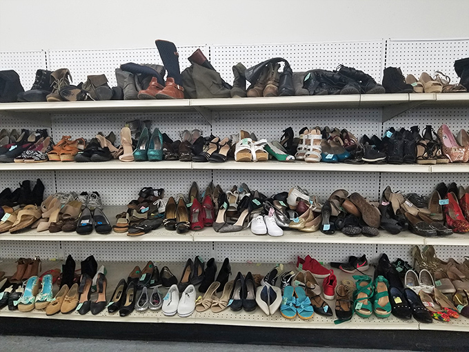 Shoe paradise! Rows of footwear waiting for their Cinderella moment. From practical flats to statement heels, each pair holds the promise of a perfect fit.