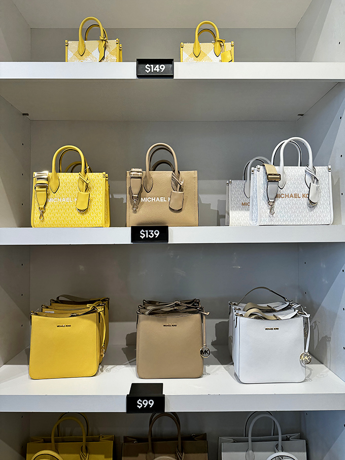 Designer handbags that normally require a small loan now tempt shoppers with prices that make luxury feel less like a splurge and more like smart shopping.