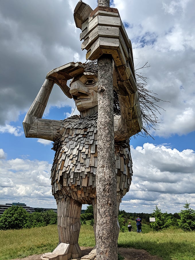 Fee-fi-fo-fum takes on artistic dimensions with this towering wooden troll, looking like he just stepped out of a Scandinavian bedtime story.