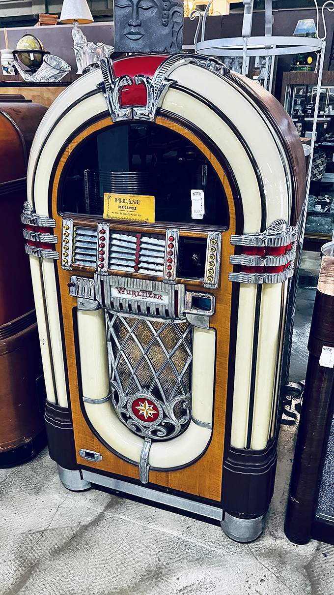 This isn't just a jukebox; it's a time machine disguised as a Wurlitzer, ready to transport you back to sock hops and soda fountains.