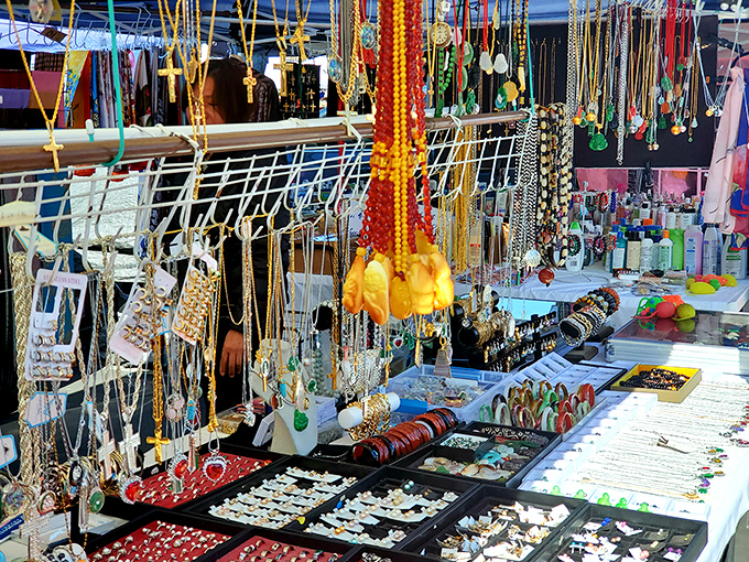 Jewelry heaven for the magpie-minded! Colorful beads and glittering pendants dangle in hypnotic rows, each piece waiting to tell a new story around someone's neck.